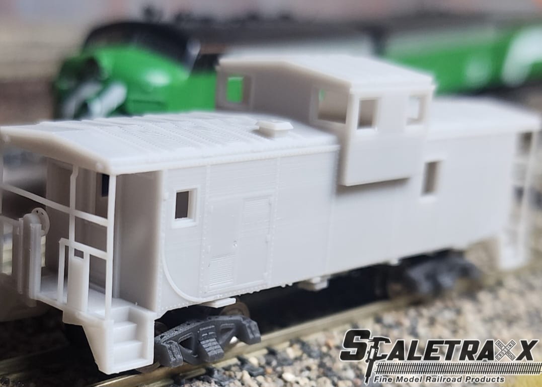 N scale DM&IR steel side caboose - scaletraxx.com